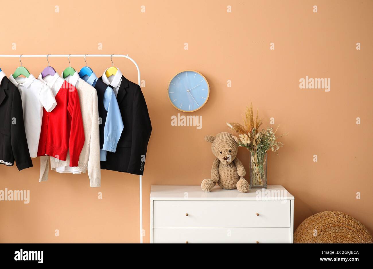 Interior of stylish room with school uniform Stock Photo - Alamy