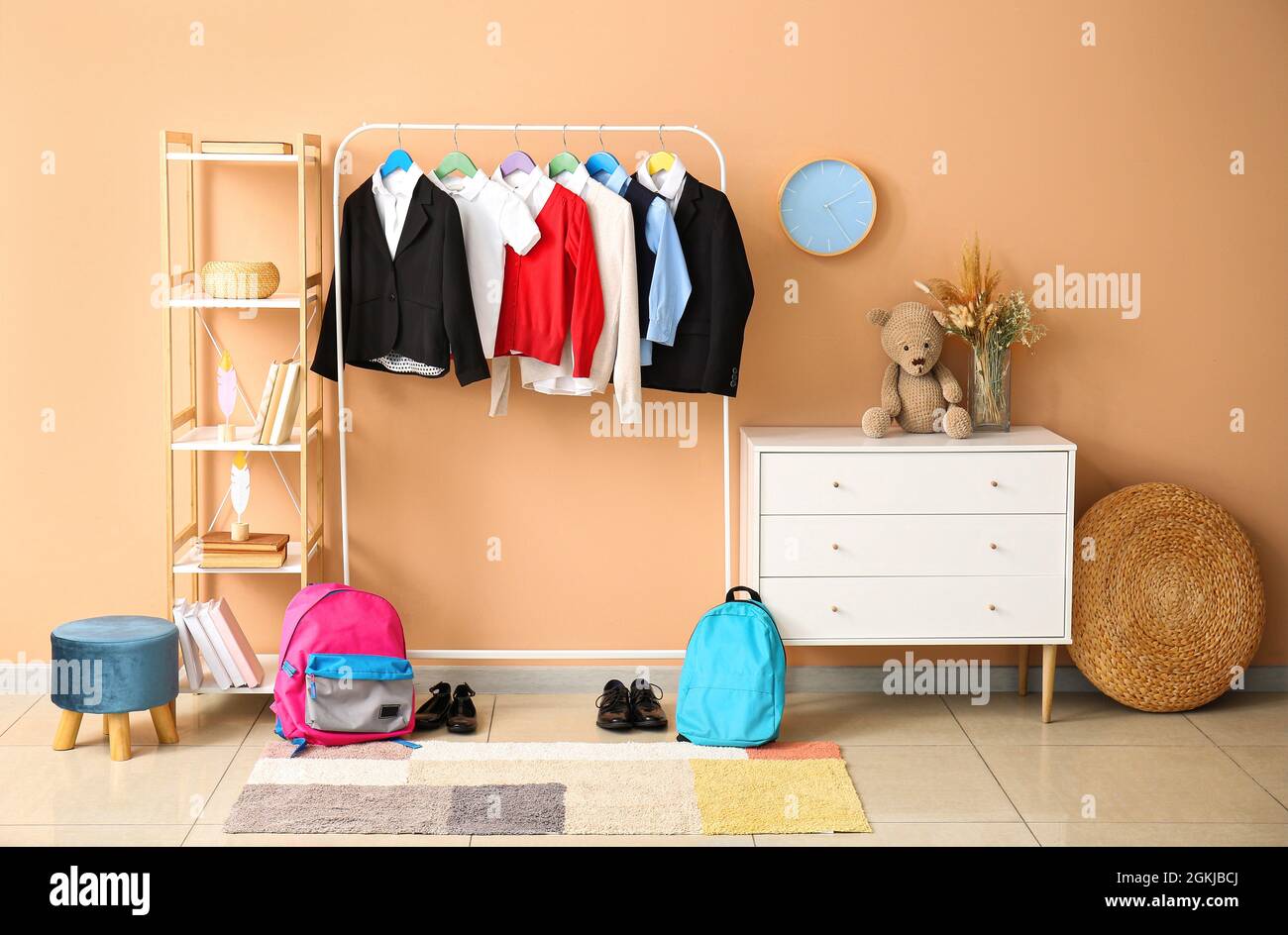 Interior of stylish room with school uniform Stock Photo - Alamy