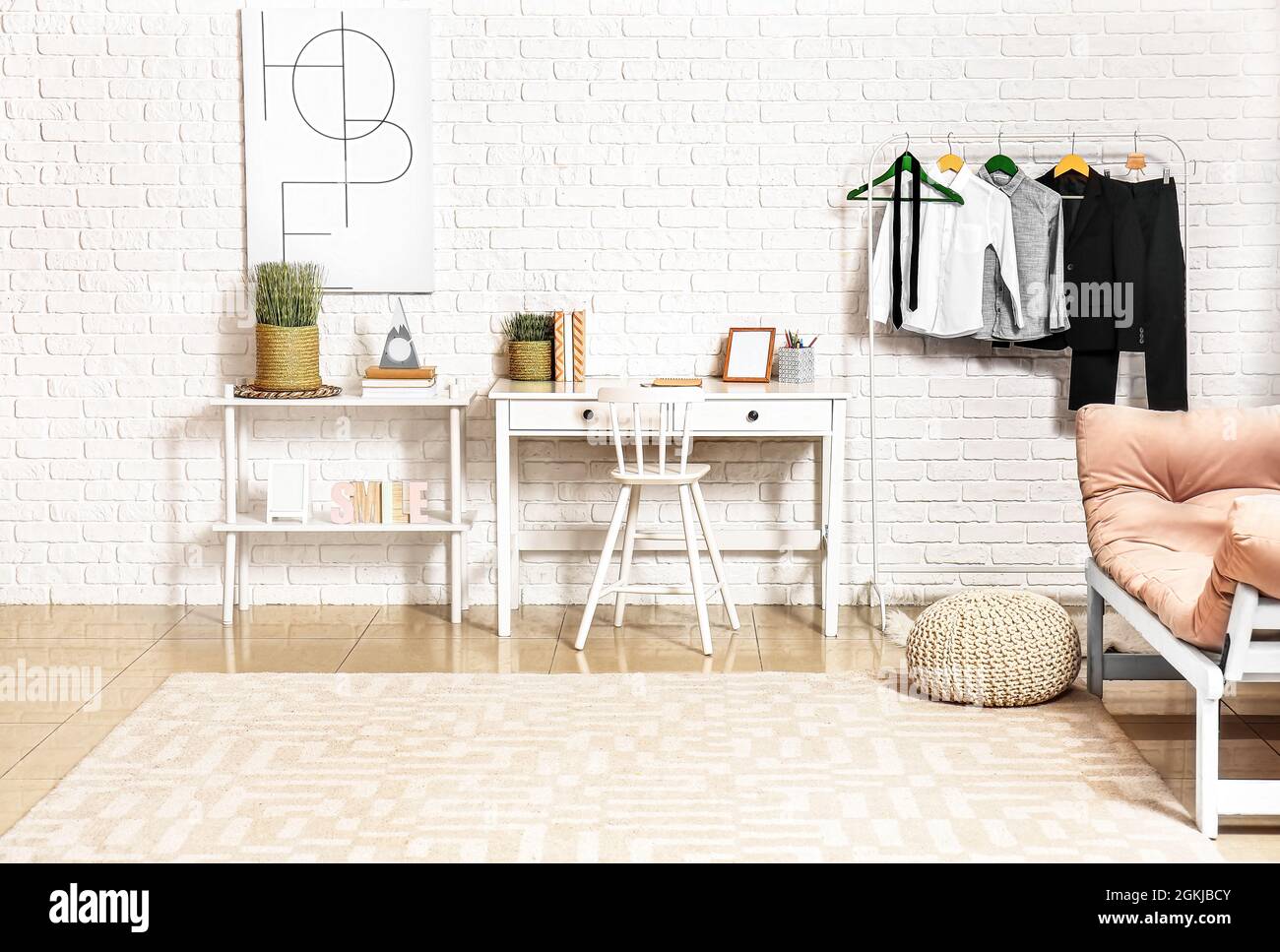 Interior of stylish room with modern workplace and school uniform Stock ...