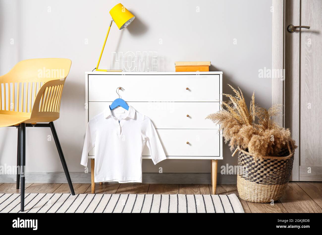 Interior of stylish room with school uniform Stock Photo - Alamy