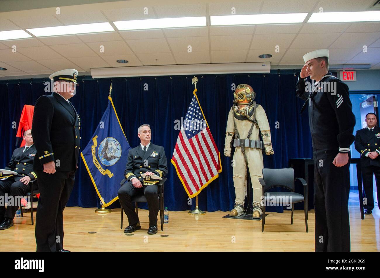 Chief Warrant Officer 3 Mark Cooper is relieved of the watch during his ...