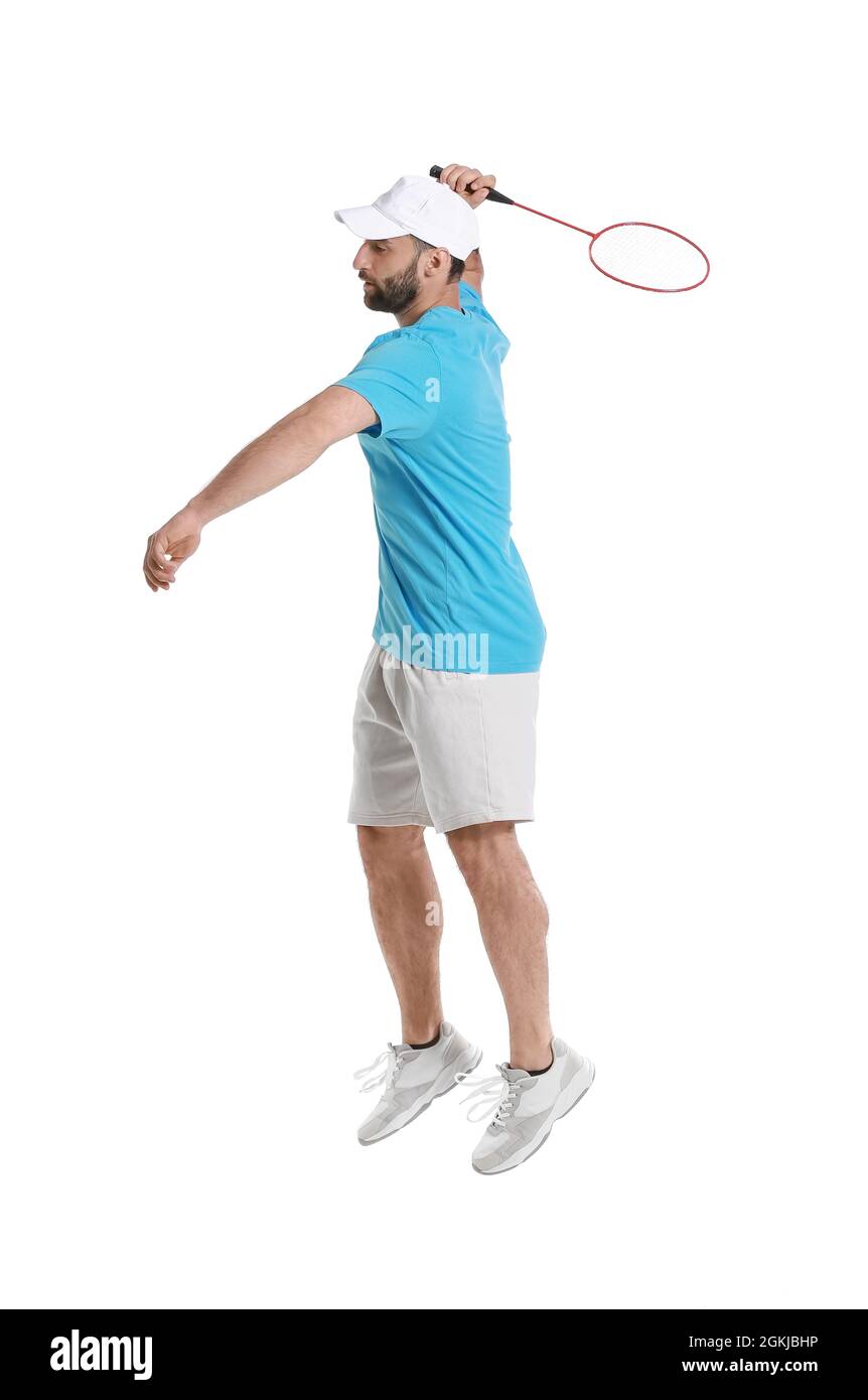 Sporty male badminton player on white background Stock Photo - Alamy