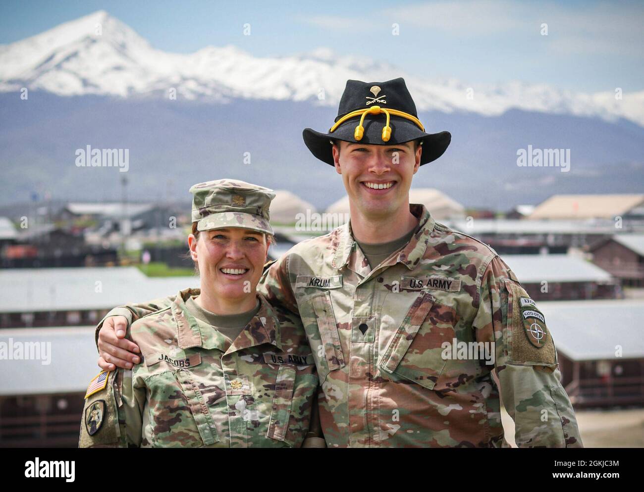 Maj. Sarah Jacobs and Spc. Dalton Krum, mother and son, smile for a ...