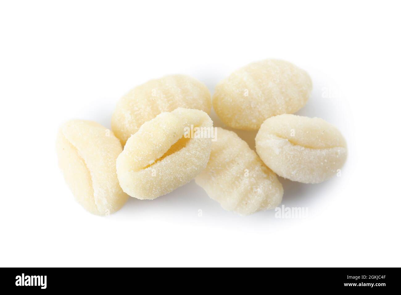 Raw gnocchi on white background Stock Photo - Alamy