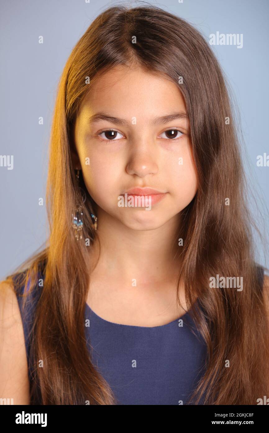 Close-up portrait of a beautiful dark-haired teenage girl 12 years old ...