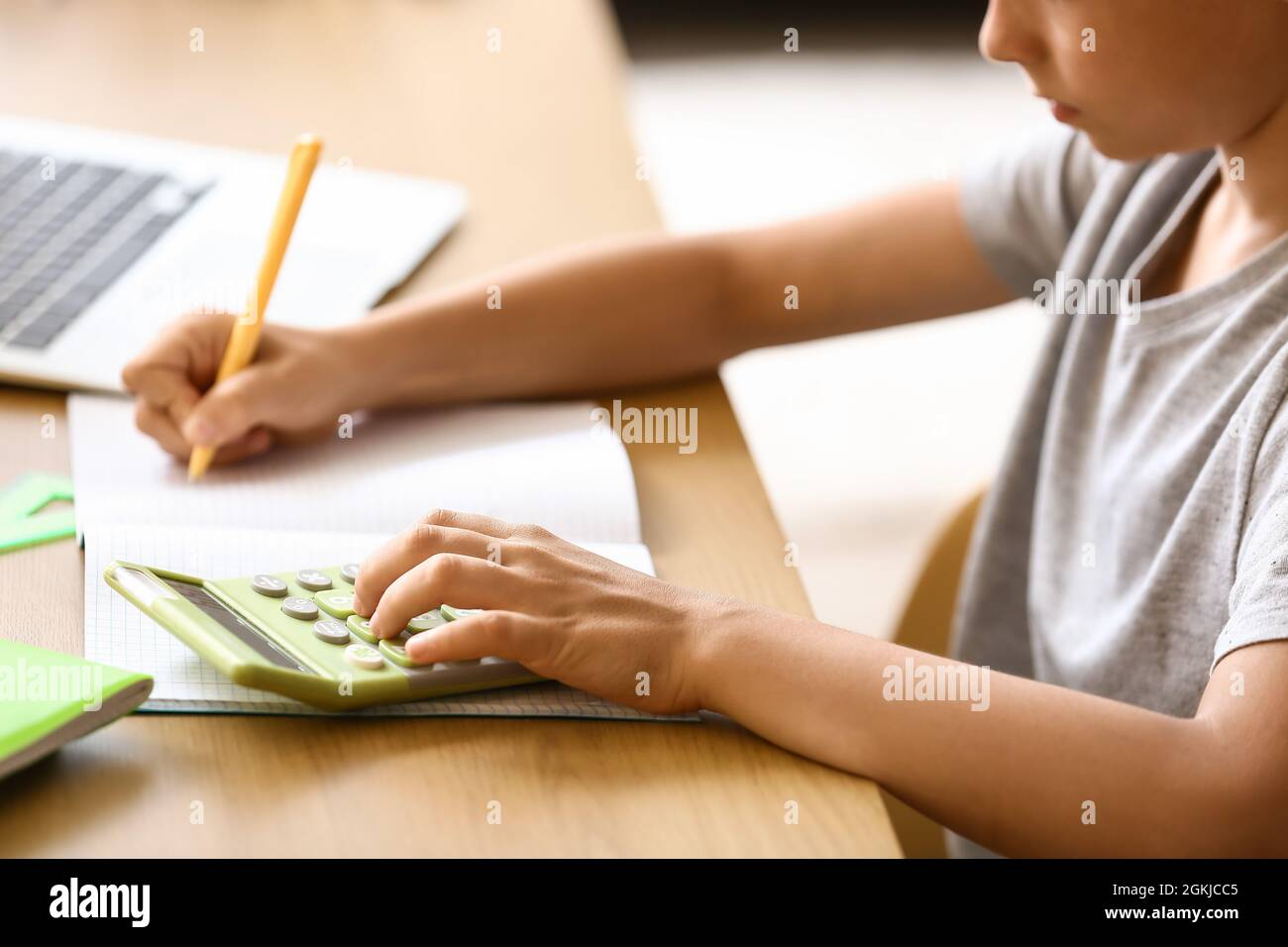 Little boy doing lessons at home, closeup Stock Photo - Alamy