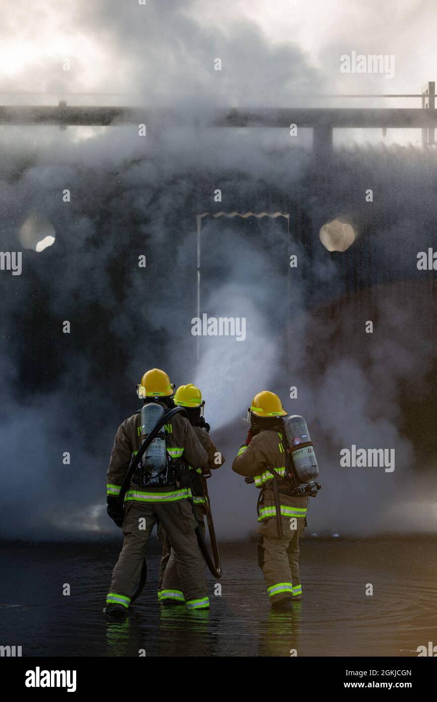 U.S. Marines with Aircraft Rescue and Firefighting (ARFF) with ...