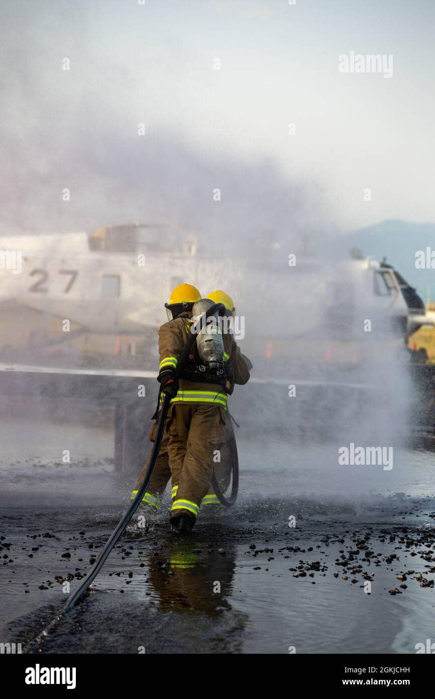 U.S. Marines with Aircraft Rescue and Firefighting (ARFF) with ...