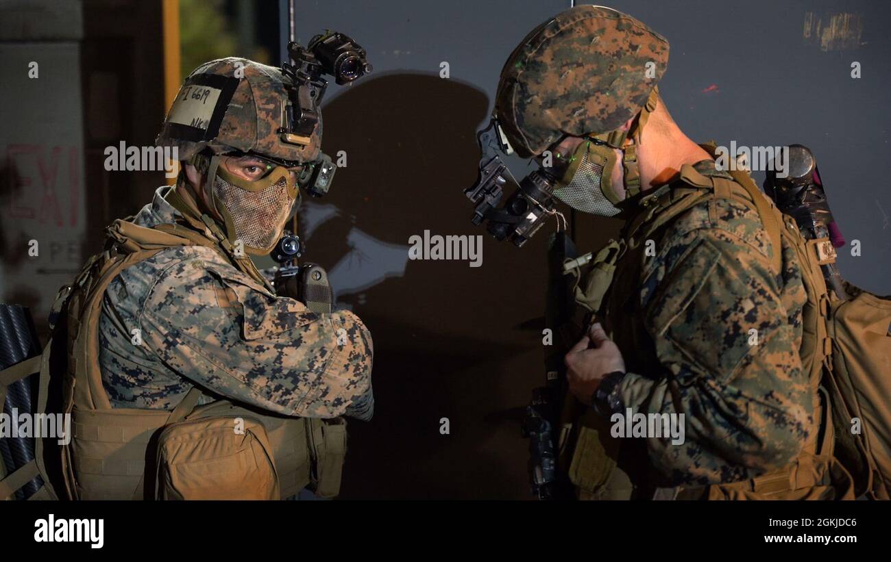 Marines acting as host-nation military members prepare to exit the ...