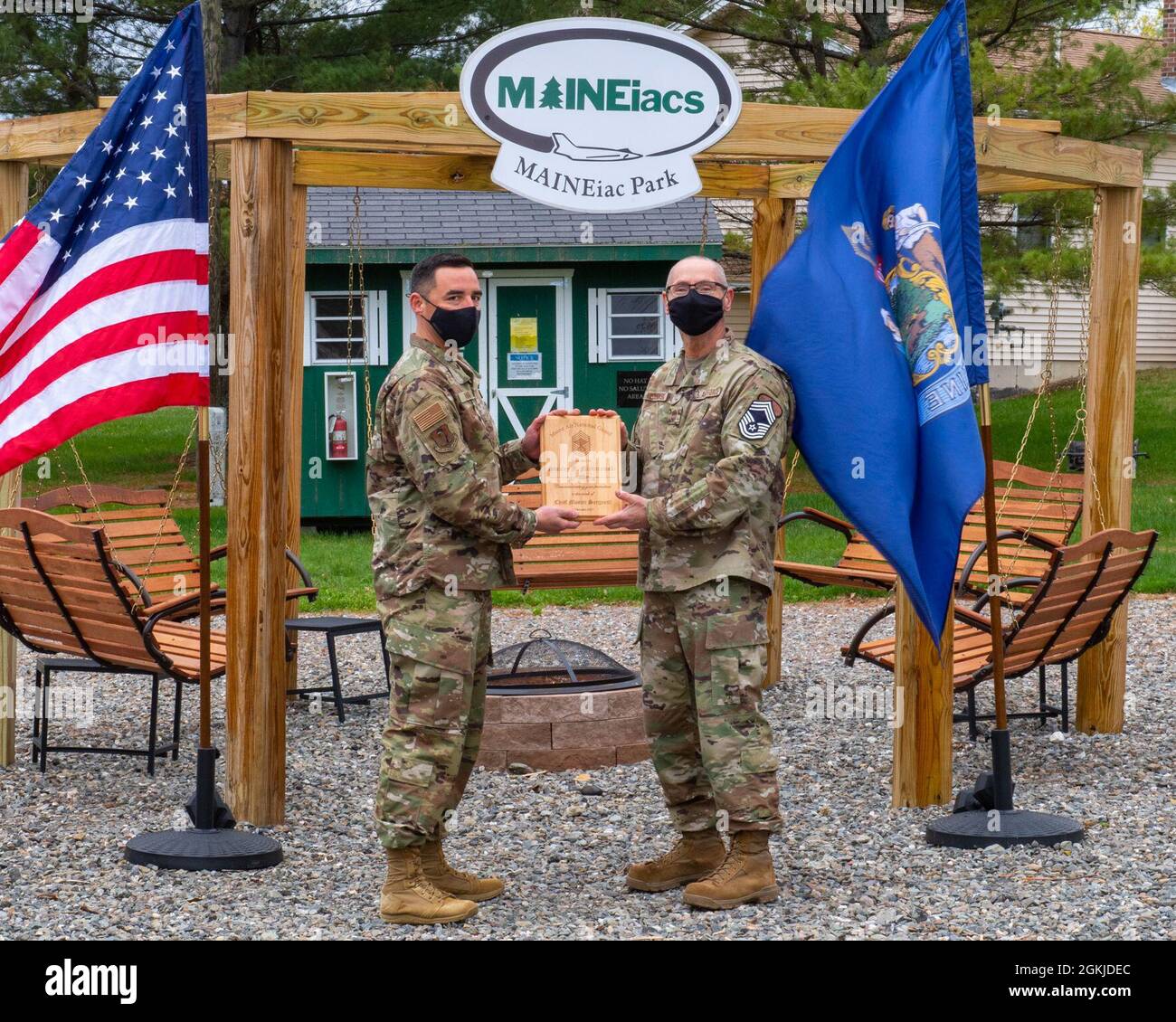 Chief Master Sgt. Nate Anaya presents Chief Master Sgt. Stan ...