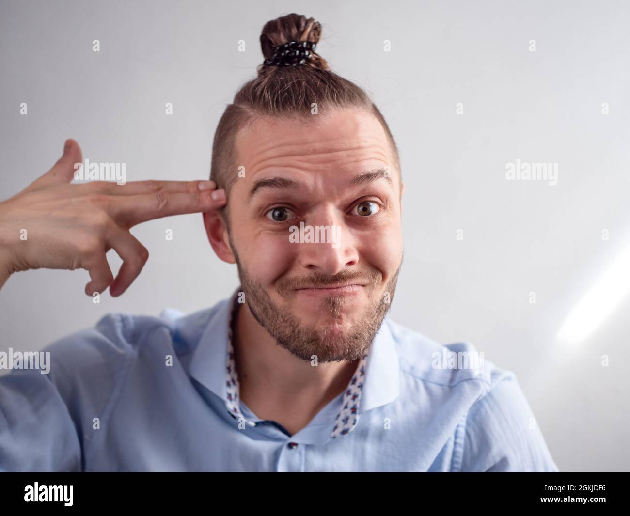 Makes a gun gesture hi-res stock photography and images - Alamy