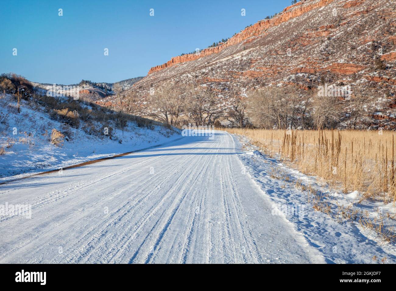 Driving in rocky mountains covered hi-res stock photography and images ...