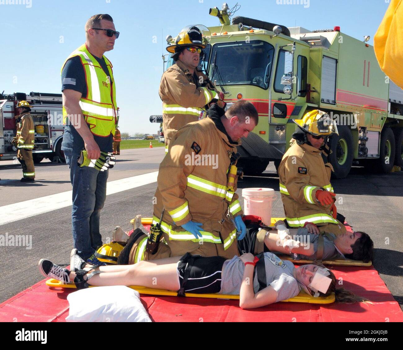 Members of the 185th Air Refueling Wing Fire Department care for ...