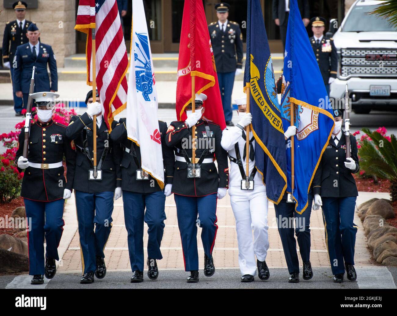 A joint-service honor guard brings in the Colors to begin the 52nd ...
