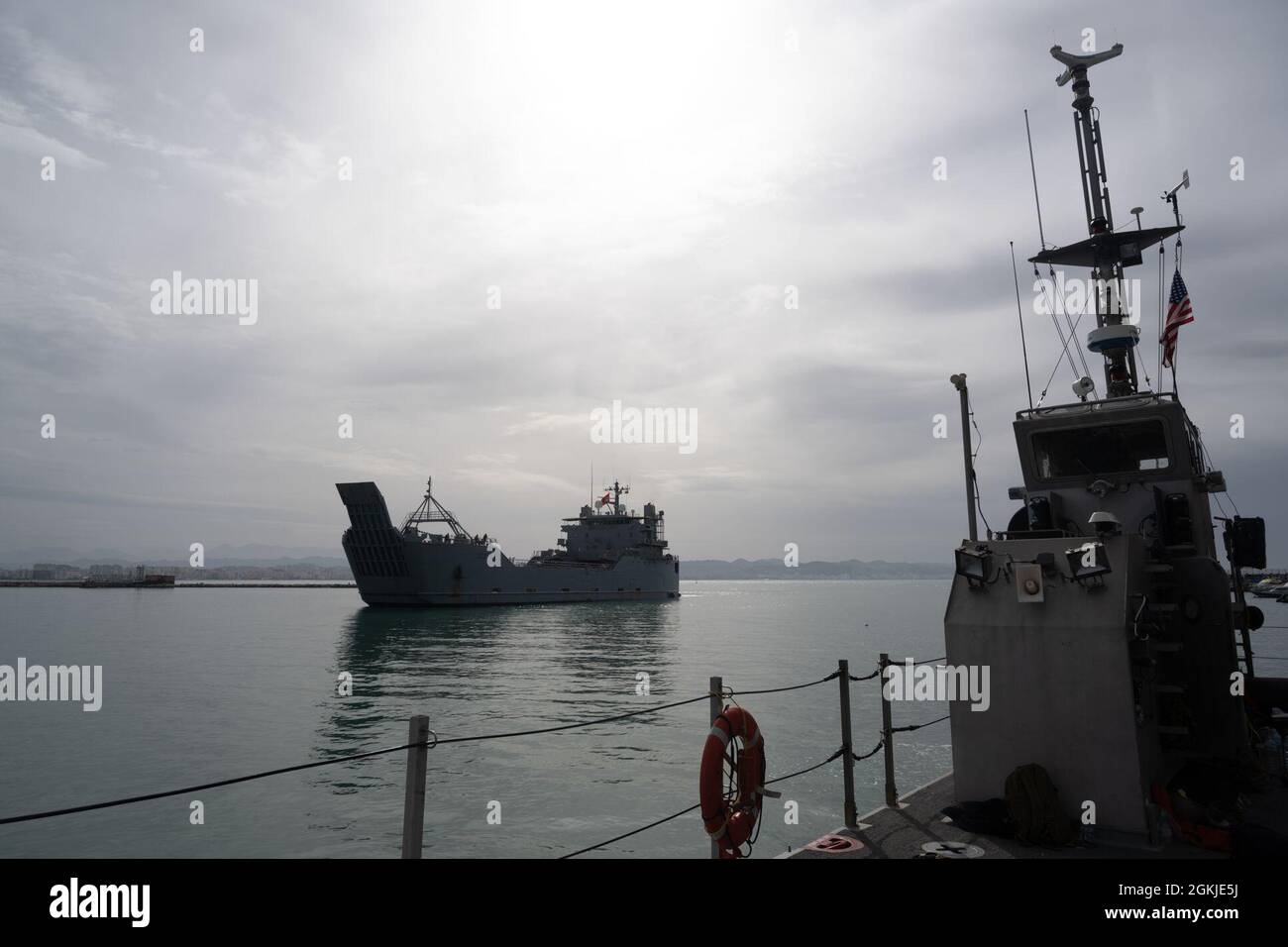 The U.S. Army’s James A. Loux (LSV-6) pulls into port for the multi ...