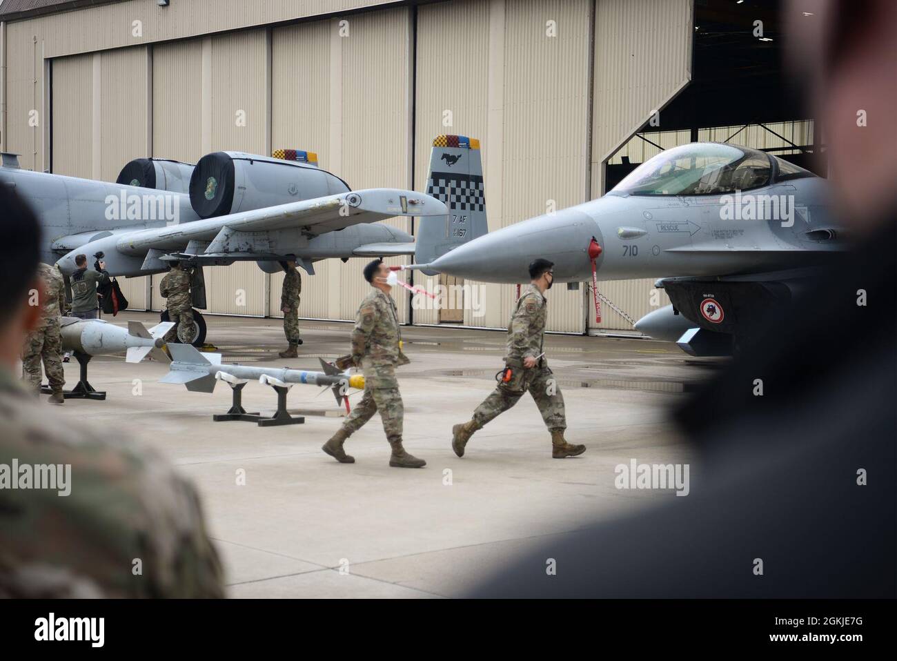 Weapons load crew members from 36th Aircraft Maintenance Unit ...