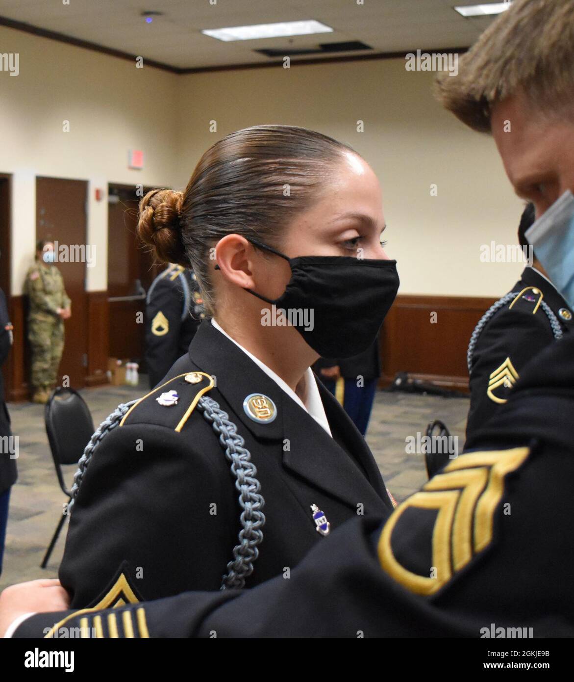 Indiana National Guard Sgt. Amber Strawn receives her blue infantry ...