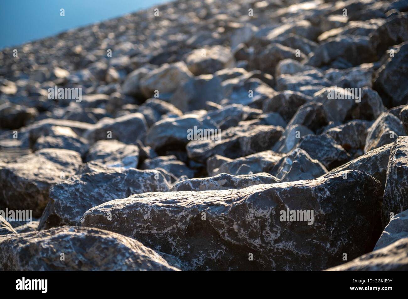 Loose rocks known as rip rap are spread along the East Branch Dam ...