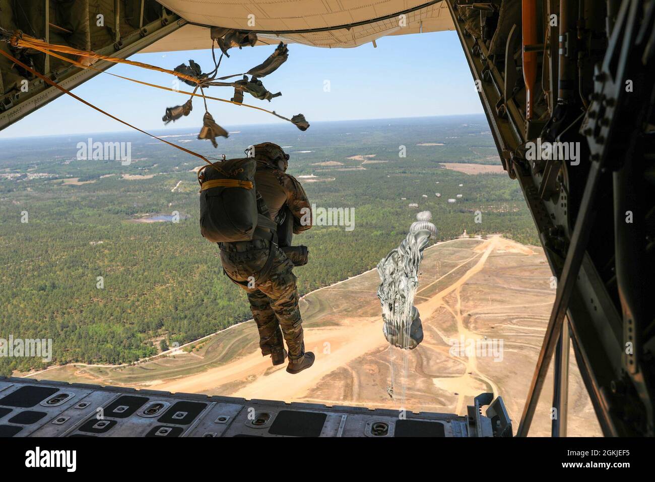Utilizing MC-6 parachutes to carry them safely to the ground ...
