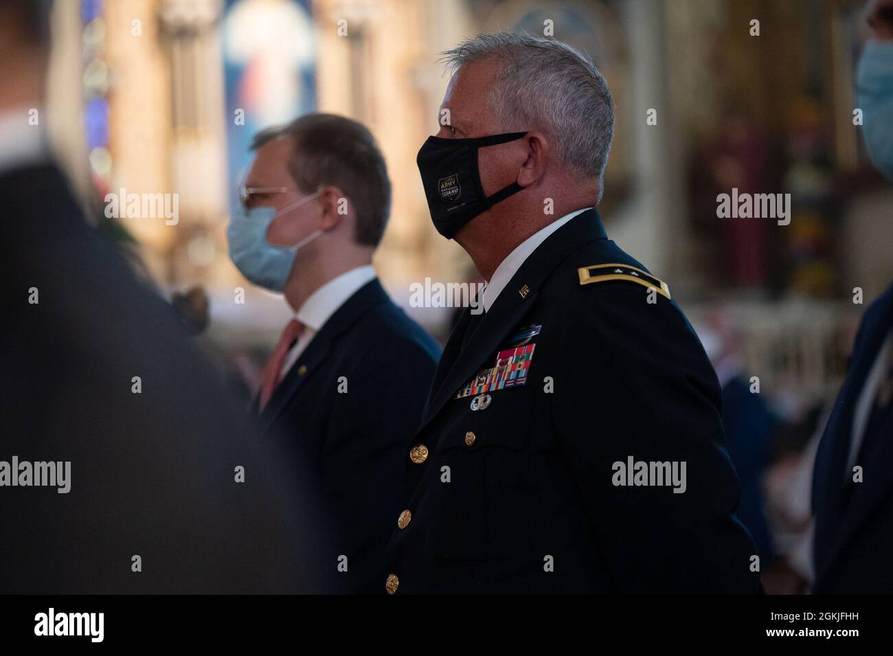 Maj. Gen. Mark Jackson, center, First Army deputy commander for ...