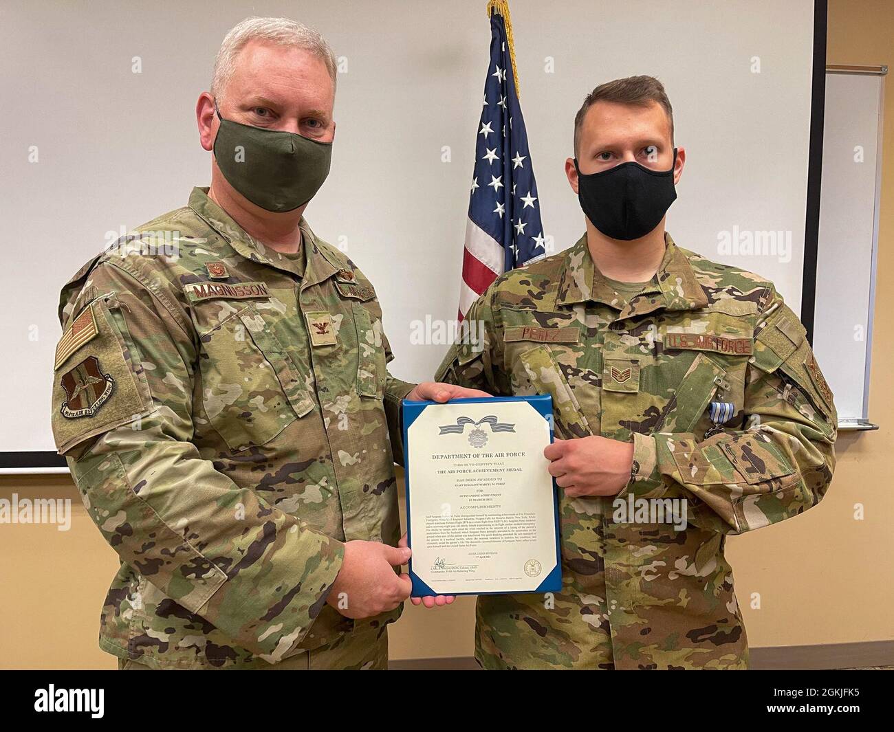 Col. Carl Magnusson, 914th Air Refueling Wing commander, poses next to ...