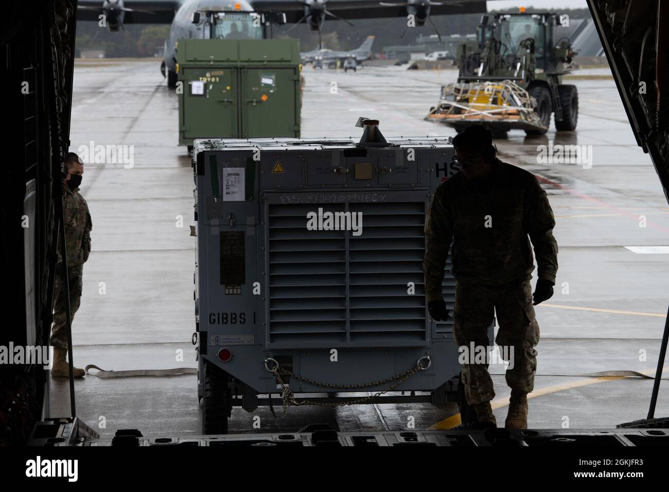 Airmen with the 35th Logistics Readiness Squadron load flight line ...