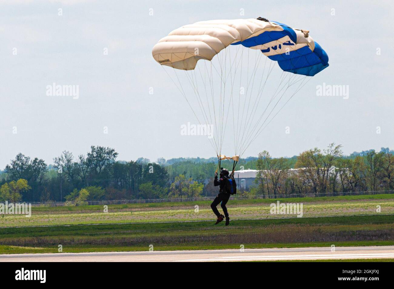 A member of the U.S. Air Force Academy parachute team, the Wings of ...