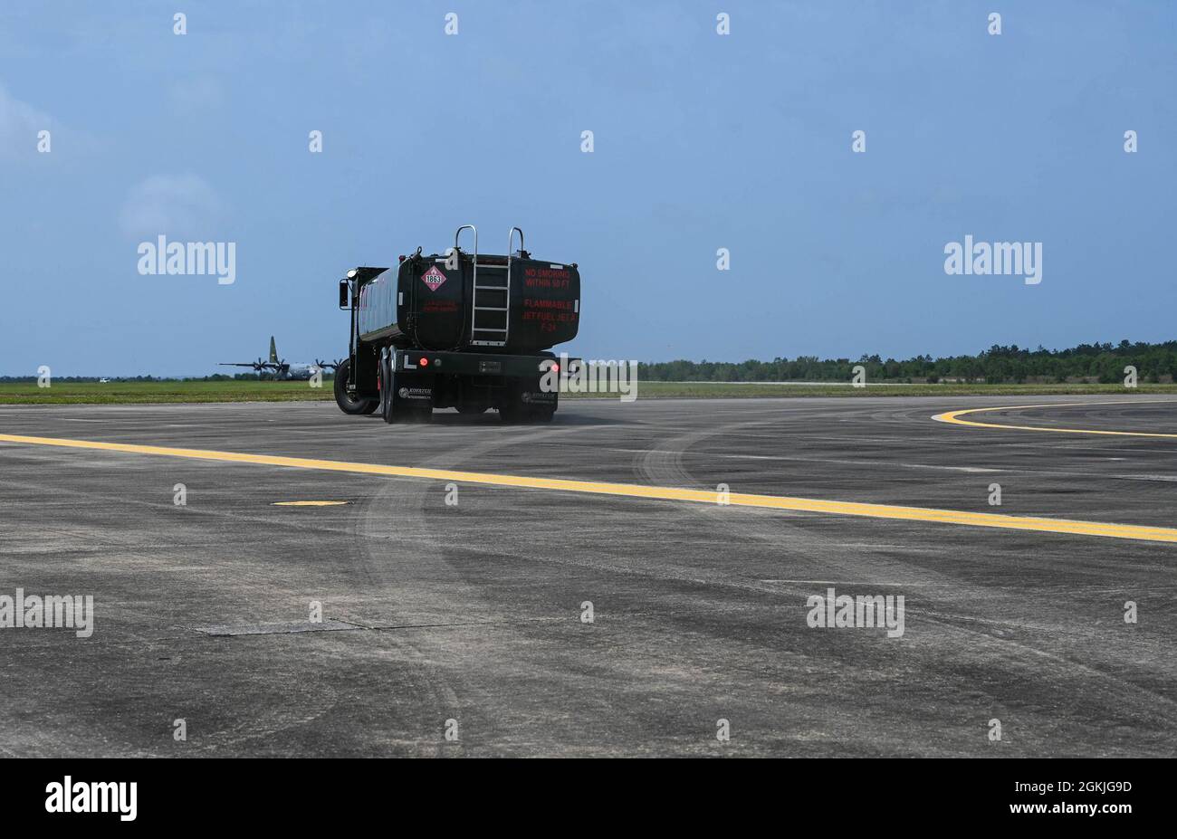 U.S Air Force Airmen wait to fuel incoming aircraft at Naval Outlying ...