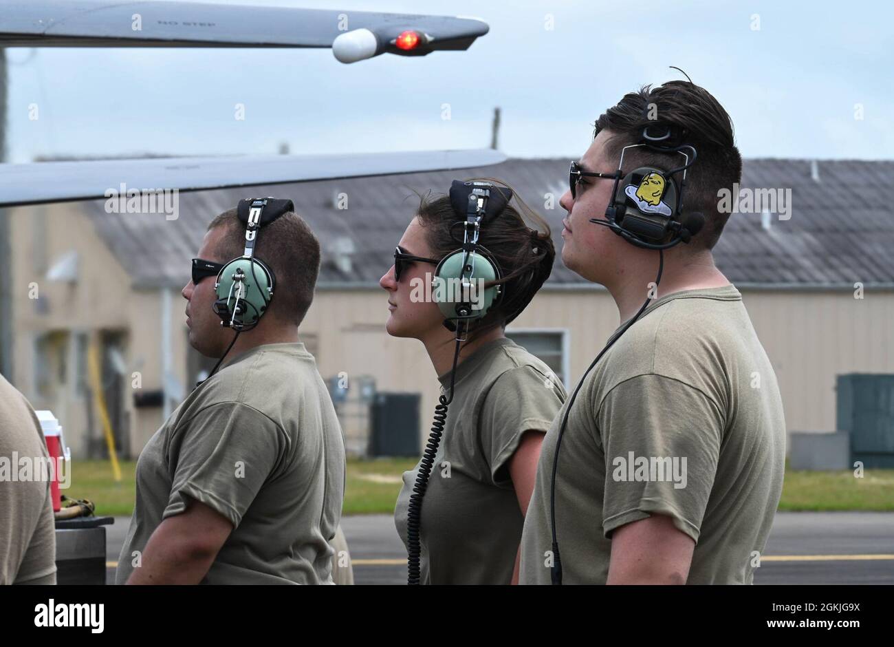 U.S. Air Force Airmen watch as an F-15E Strike Eagle prepares to depart ...