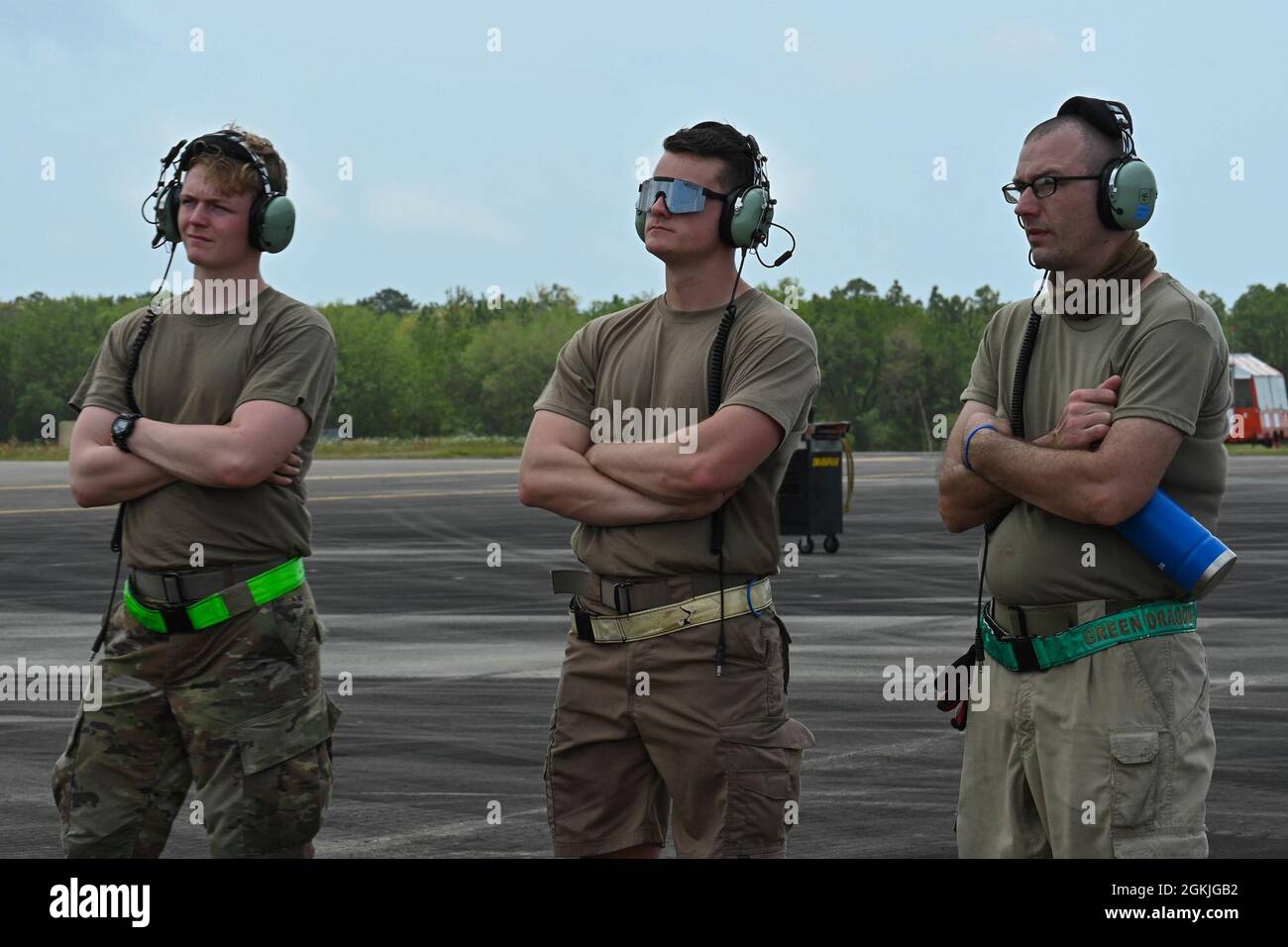 U.S. Air Force Airmen watch as an F-15E Strike Eagle prepares to depart ...