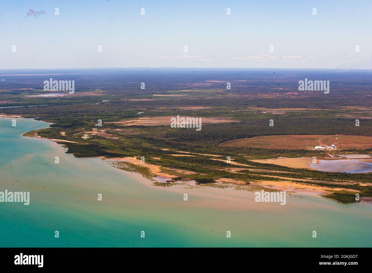 A MV-22 Osprey flies over the Darwin coast of the Northern Territory of ...