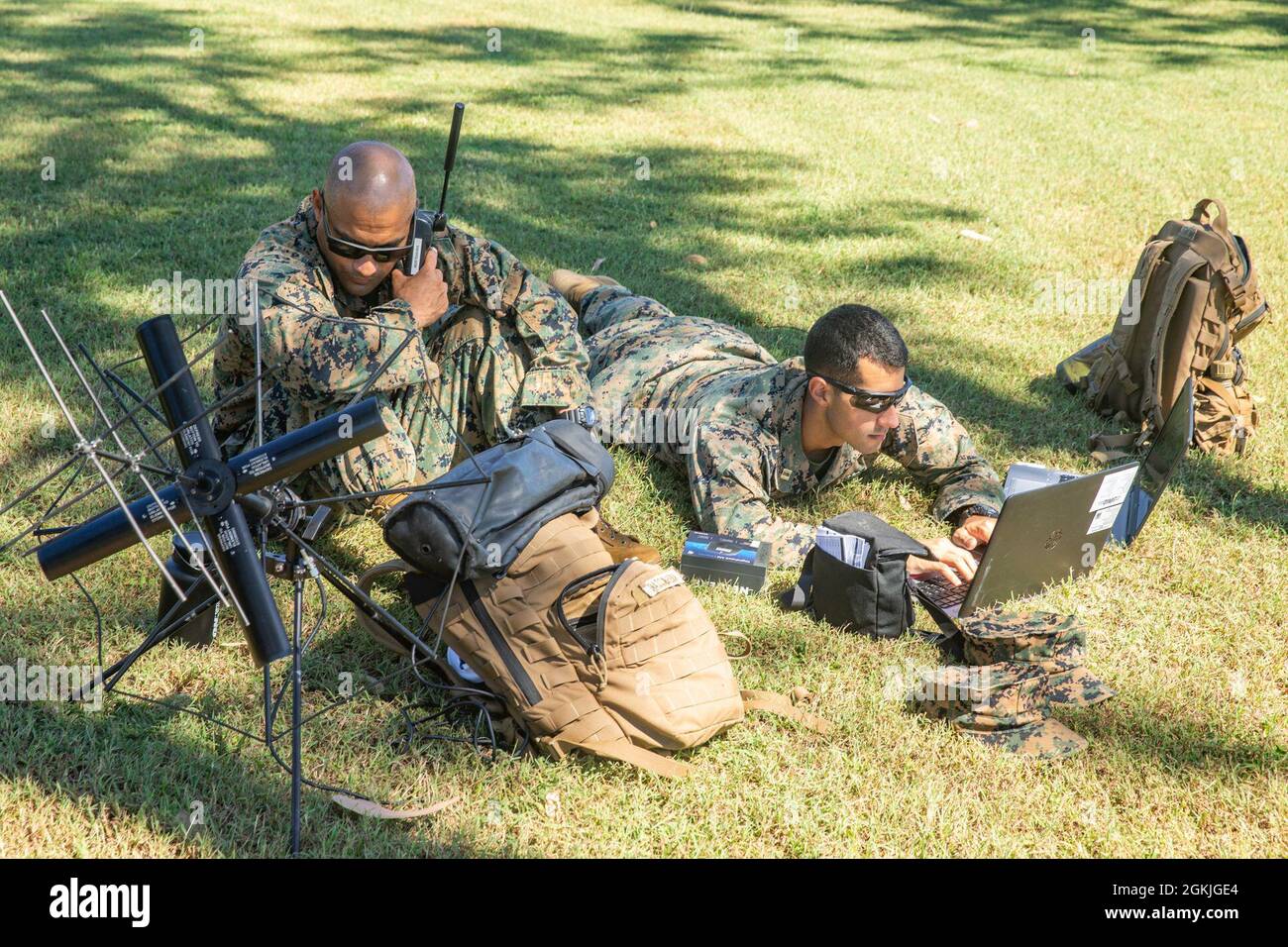 U.S. Marine Corps Master Sgt. Joseph Diazcabrera, left, communications ...