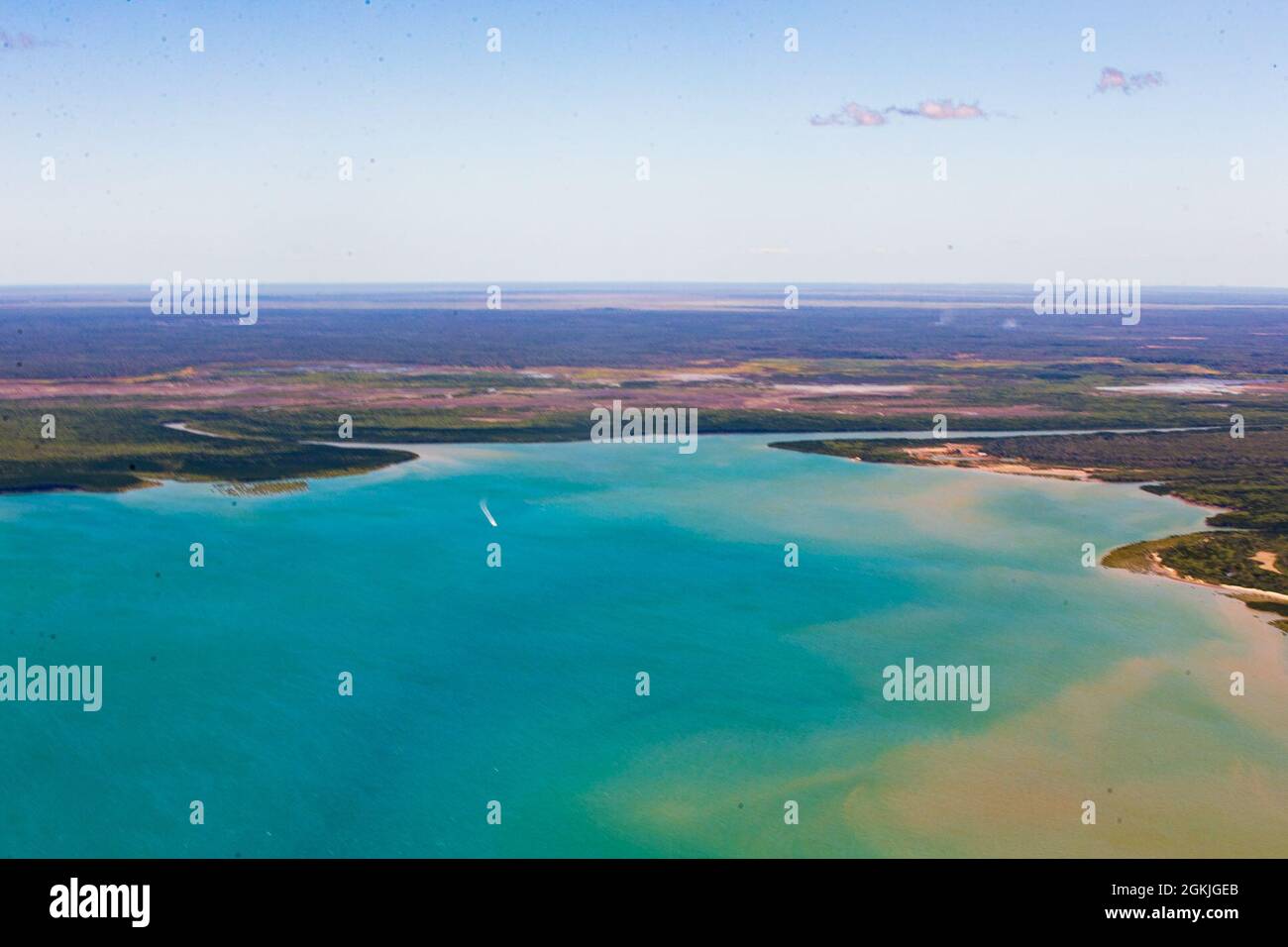 A MV-22 Osprey flies over the Darwin coast of the Northern Territory of ...
