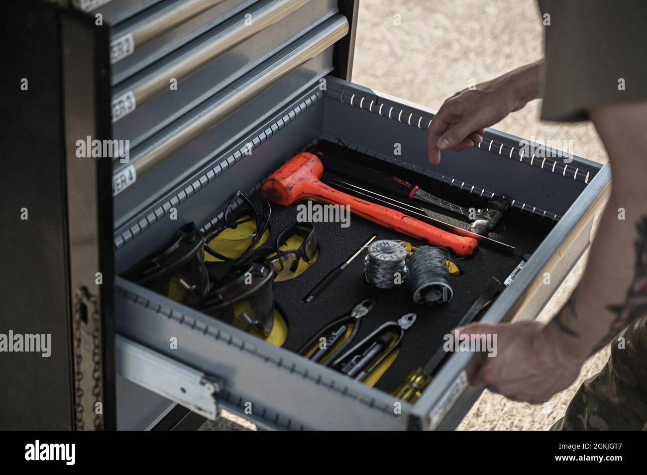 U.S. Air Force Senior Airman Paul Seagraves, a weapons load crew member ...