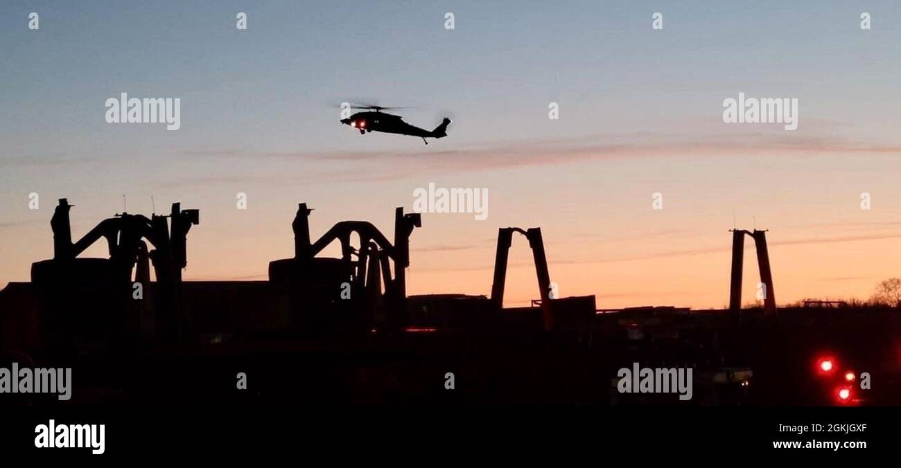 The Aviation Soldiers conduct aerial security as the sun sets over Camp ...
