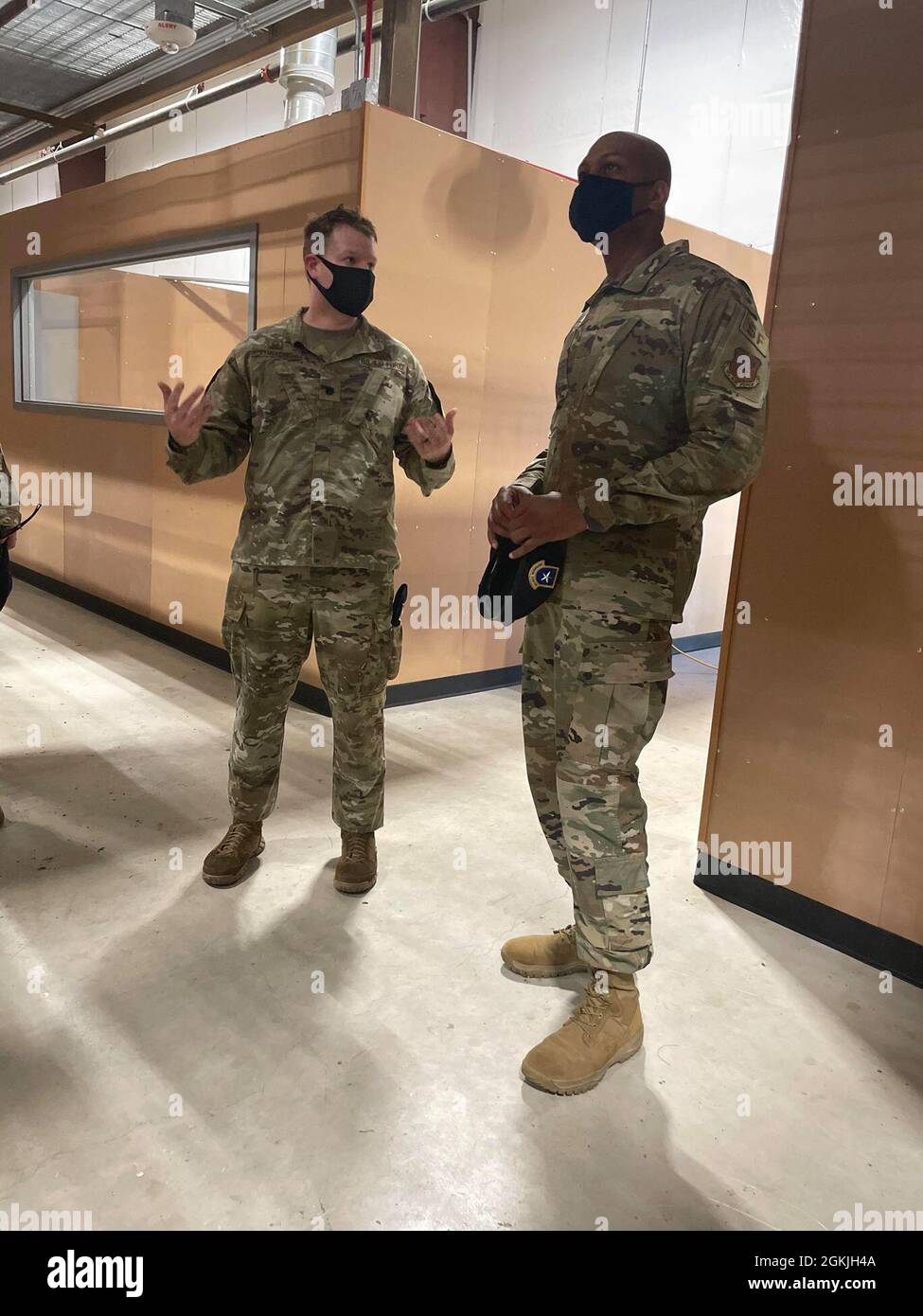 Lt. Col. Matthew Kowalski, 341st Training Squadron commander, (left ...