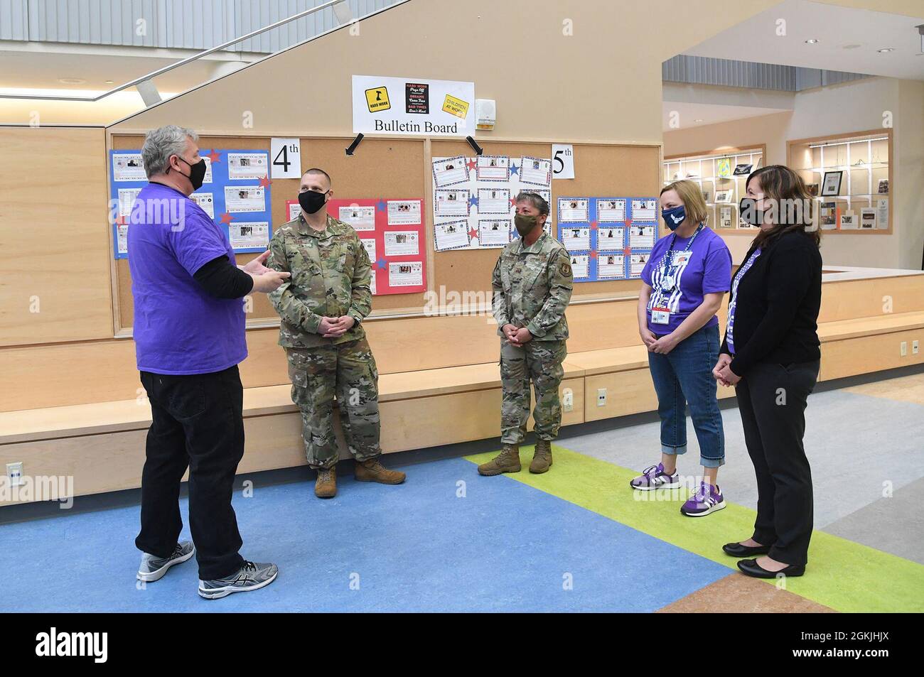 Erich Ledebuhr, left, Hanscom Middle School principal, speaks to Chief ...