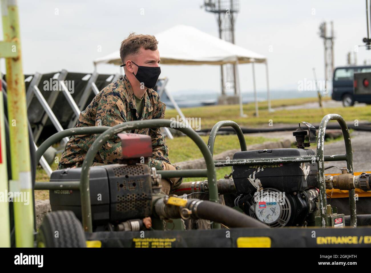 A U.S. Marine from the Marine Wing support Squadron 172, observes a hot ...