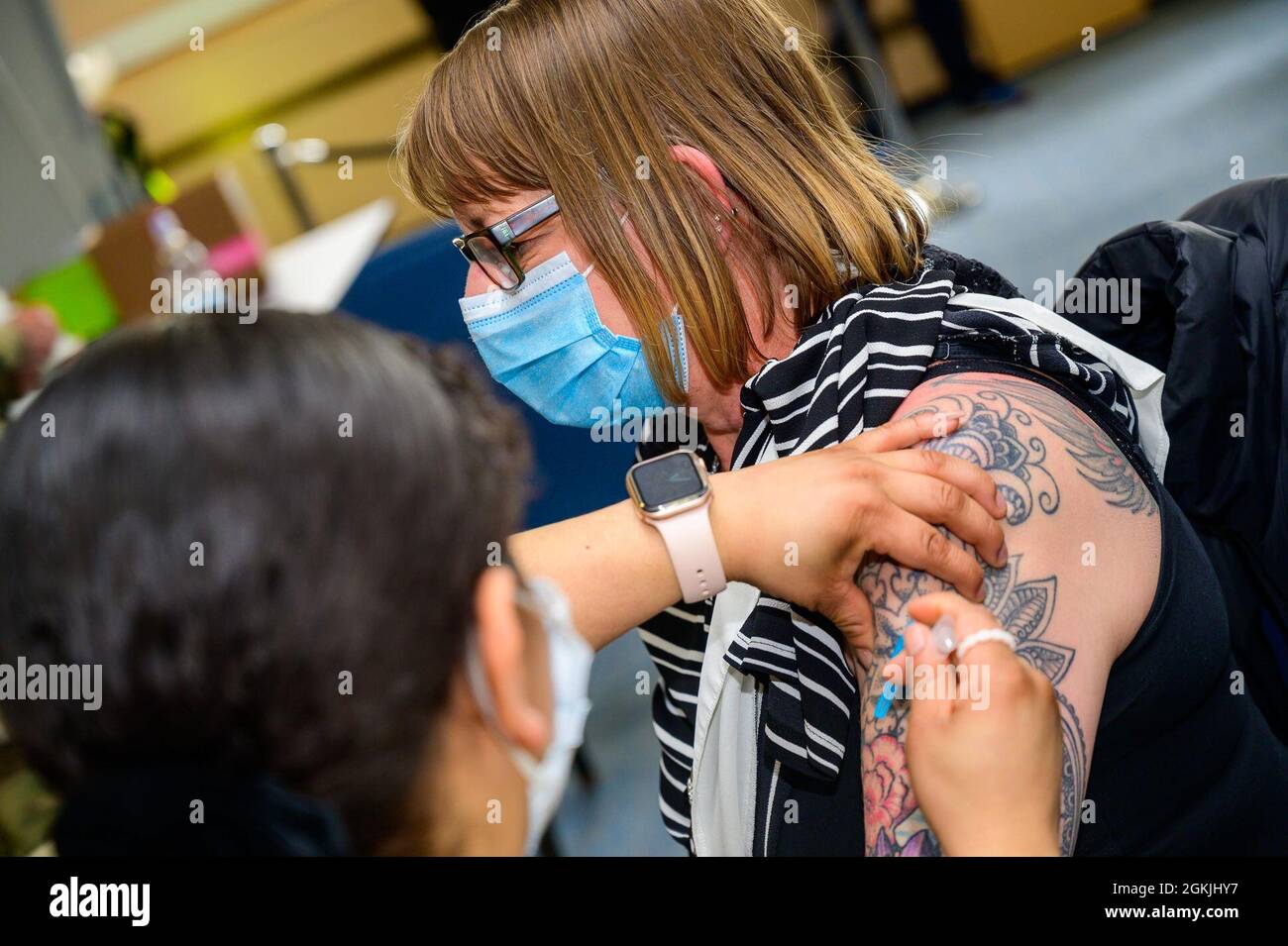 Sabine Bock, who works at the Kelley commissary, receives her COVID-19 ...