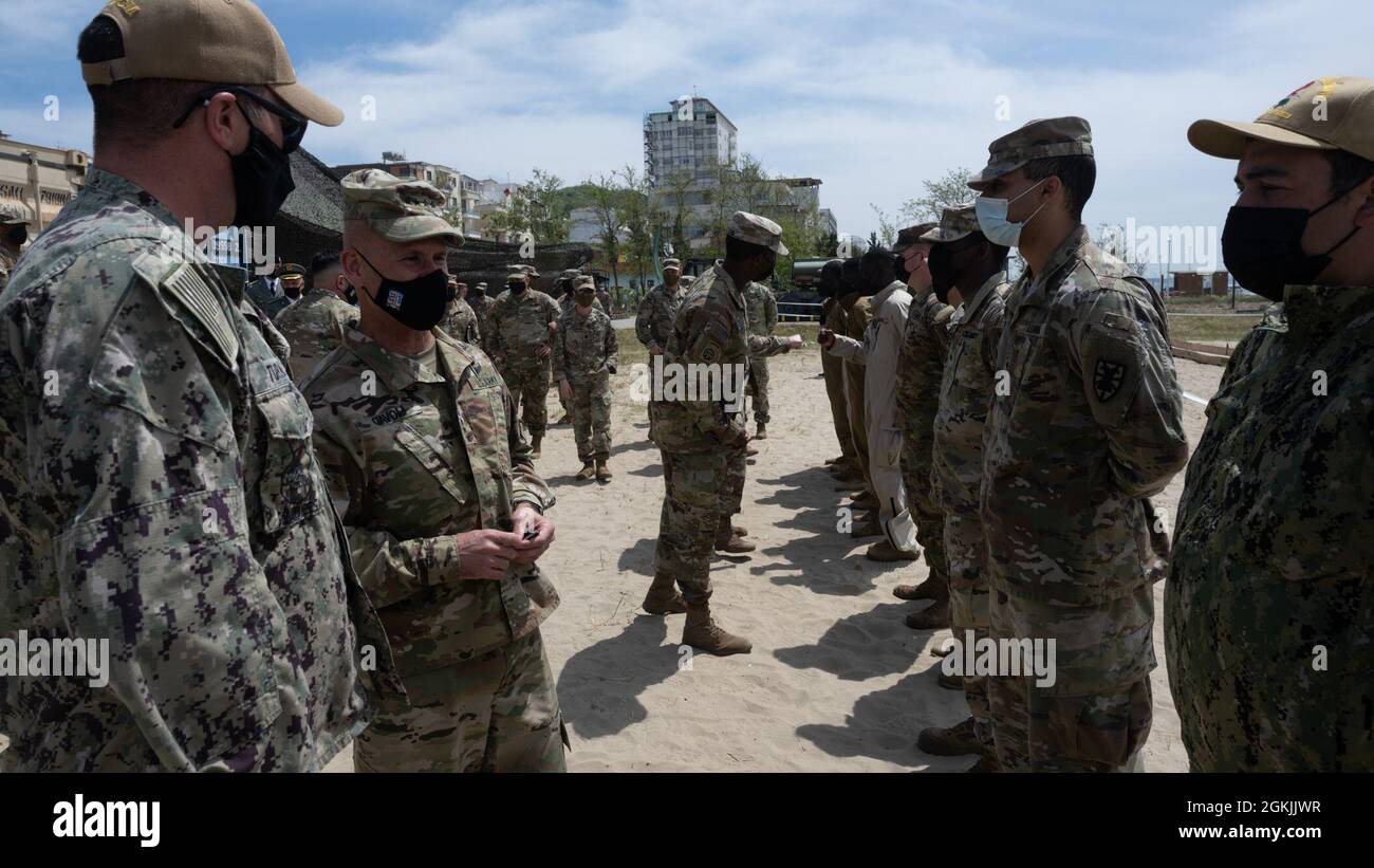 U.S. Army Gen. Christopher G. Cavoli (center left), U.S. Army Europe ...