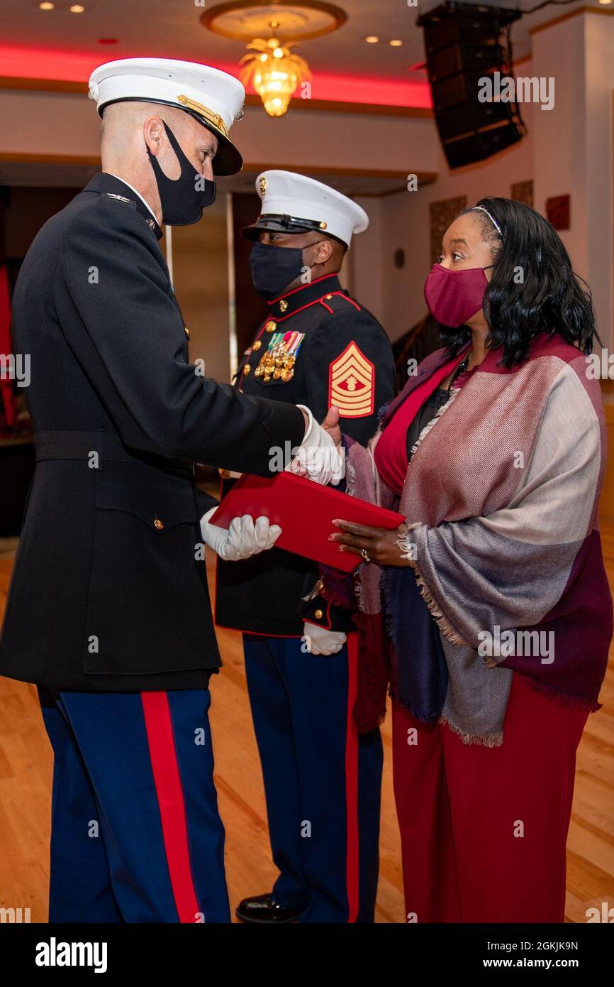 Camisha Callier is presented with a letter of appreciation for her ...