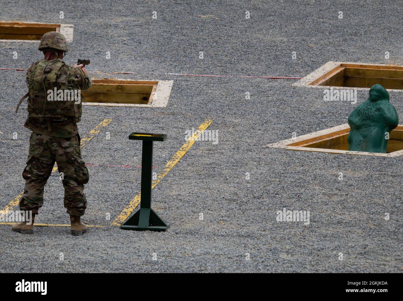 A U.S. Soldier assigned to Regional Command-East, Kosovo Force, fires a ...
