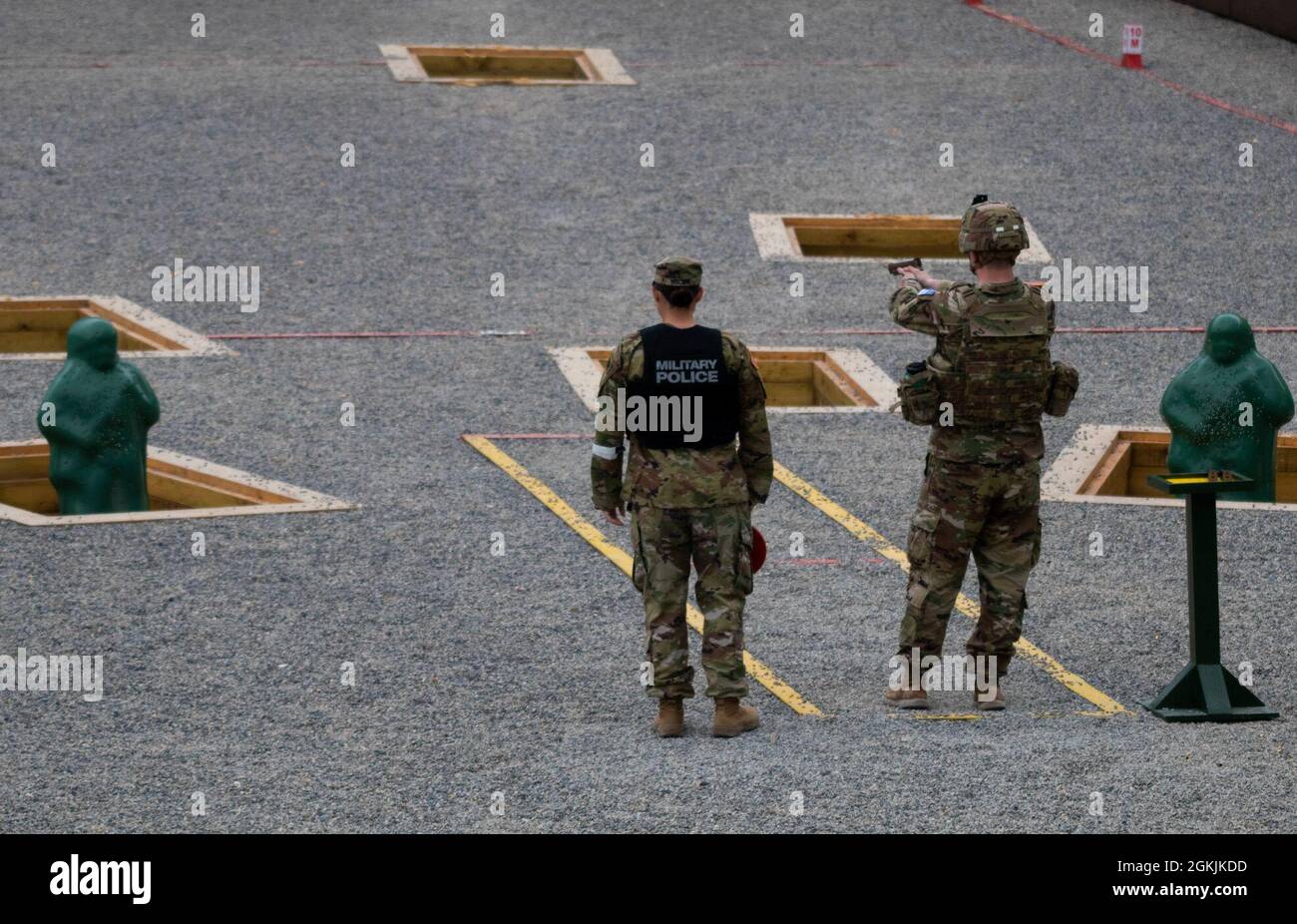 A U.S. Soldier assigned to Regional Command-East, Kosovo Force, fires a ...