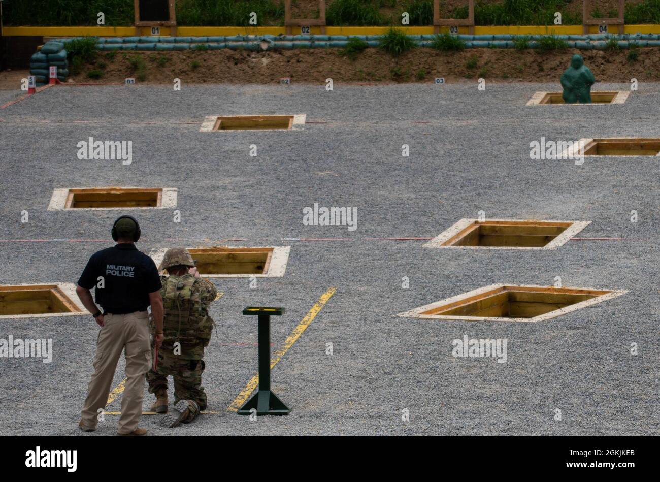A U.S. Soldier assigned to Regional Command-East, Kosovo Force, fires a ...