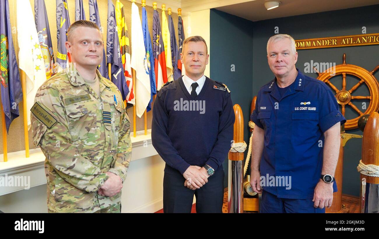 Vice Adm. Steven Poulin, commander of the Coast Guard Atlantic Area Command, meets with Rear Adm ...