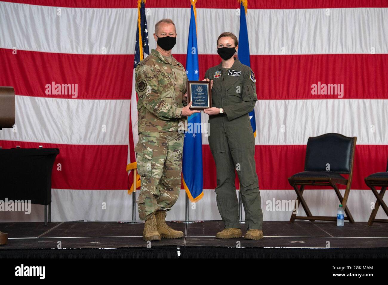 U.S. Air Force Gen. Mark Kelly, left, commander of Air Combat Command ...