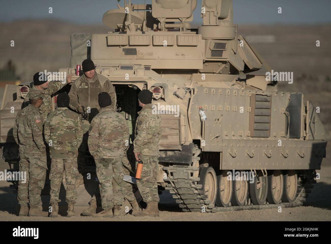Idaho Army National Guard Staff Sgt. Daniel Spady briefs a group of ...