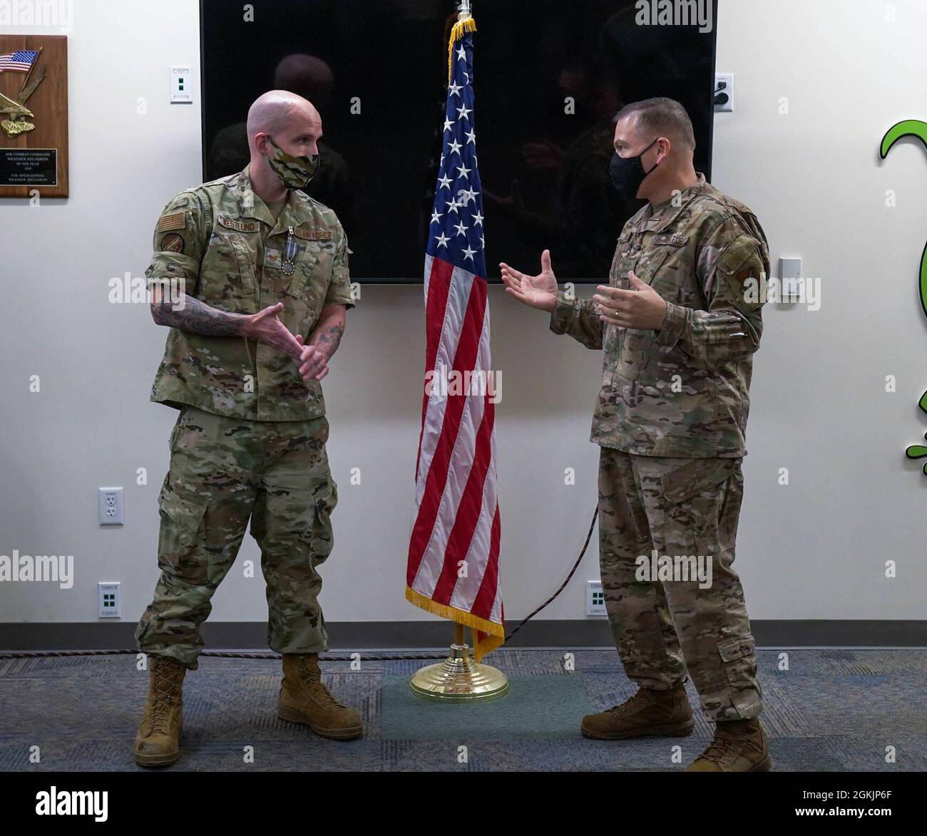 Chief Master Sgt. Steven Koehler, 15th Wing command chief presents a ...