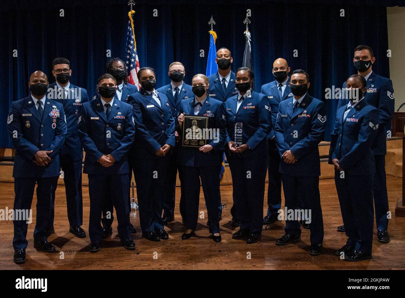 Airman Leadership School (ALS) Class 21-D students, pause for a photo ...