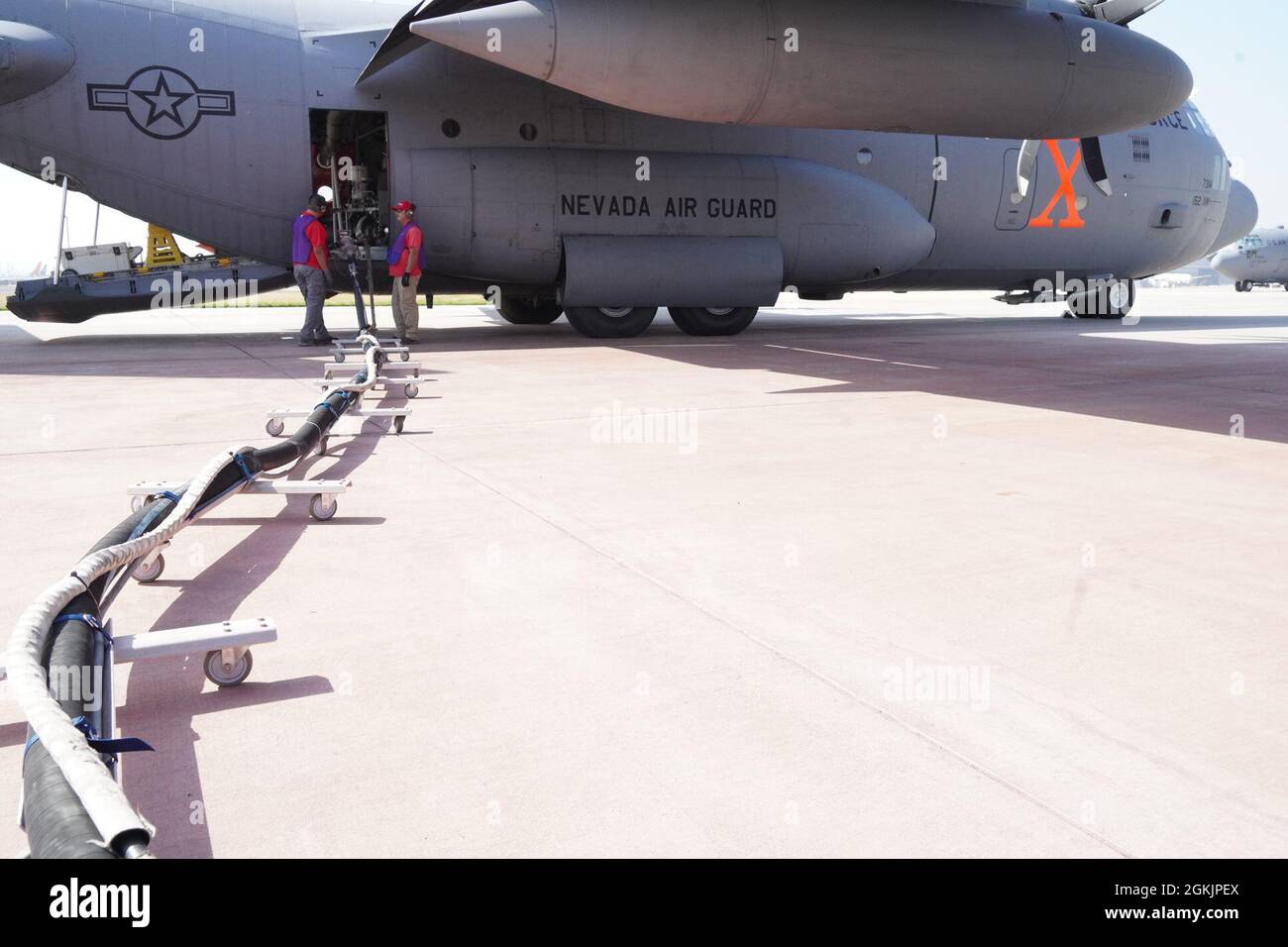 MAFFS (Modular Airborne Fire Fighting System) ground crew members ...